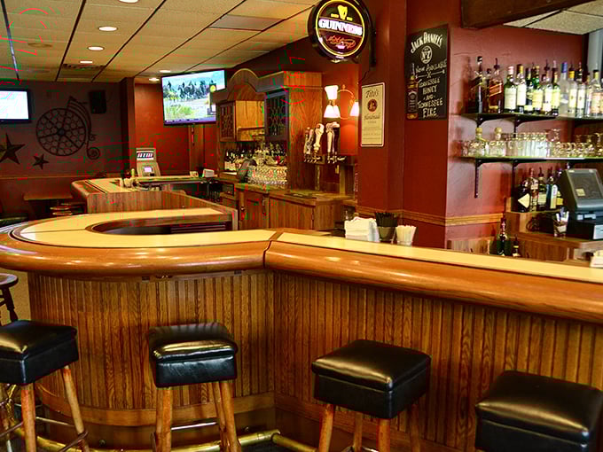 The bar doesn't just serve drinks—it creates community. That warm wood paneling has absorbed decades of stories, celebrations, and occasional secrets.