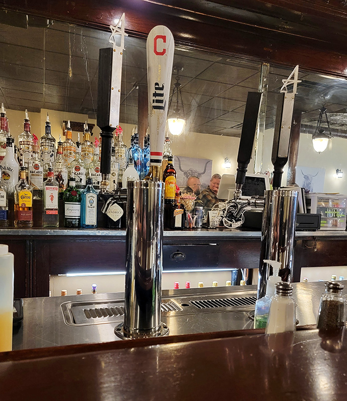 The bar's tap handles tell stories of local pride. This isn't just where drinks are poured—it's where neighborhood legends are born and retold.