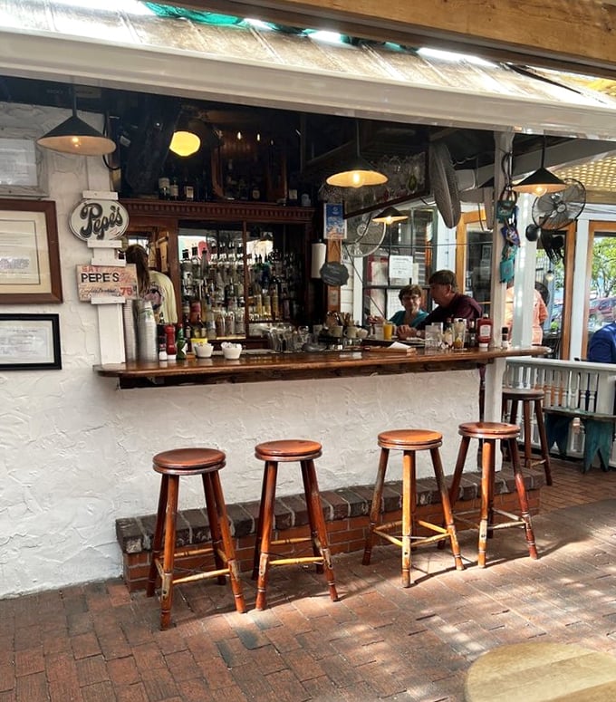 A bar that doesn't need neon signs or fancy mixologists – just honest pours, cold beer, and bartenders who remember your name.