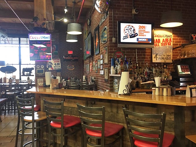 The bar area: where cold beer meets hot barbecue in a romance that's lasted longer than most Hollywood marriages.