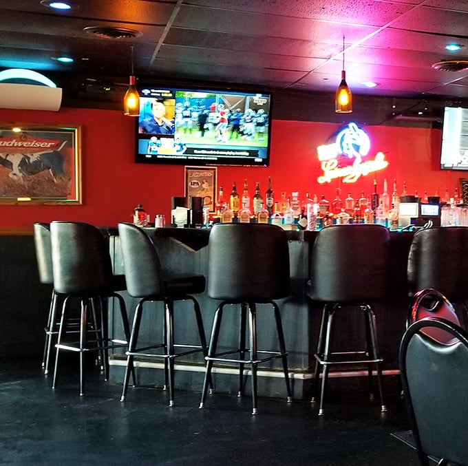 The bar beckons with promises of cold beer and conversations that solve the world's problems.