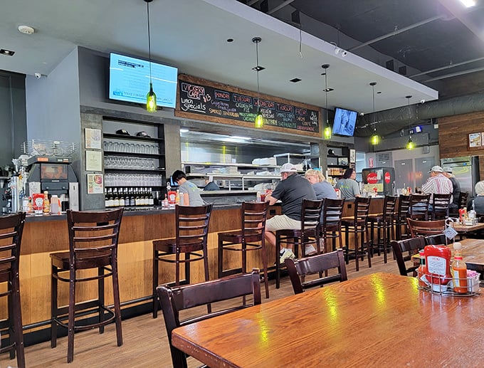 The counter seats are where the magic happens—front-row tickets to the breakfast show where regulars exchange knowing nods about what to order.