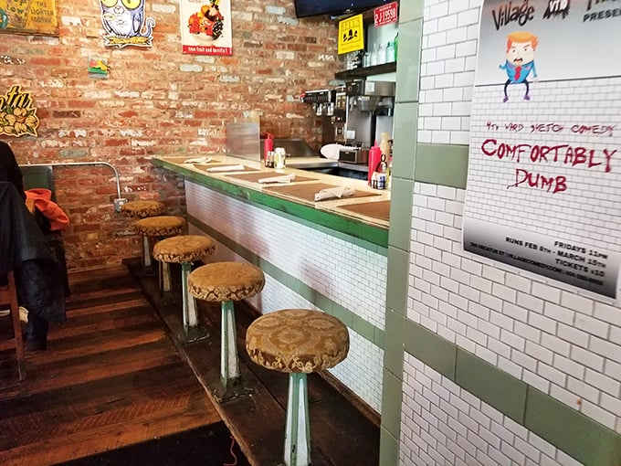 The counter seating offers front-row tickets to the culinary show, where breakfast dreams come true and diet plans go to die.