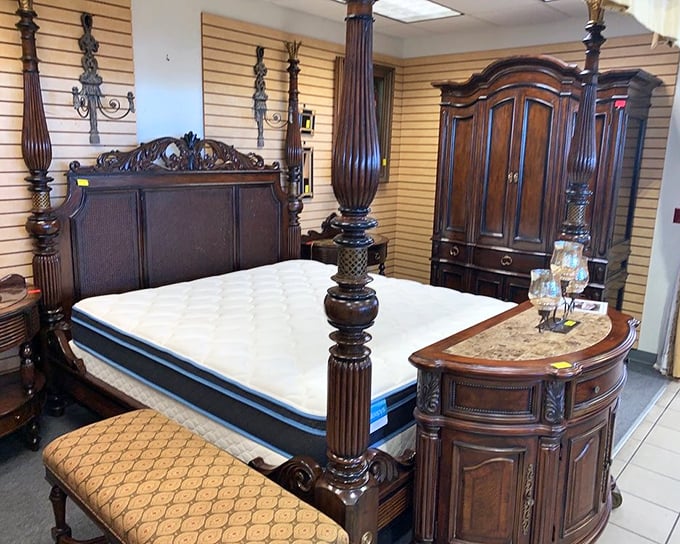 This four-poster bed isn't just furniture—it's practically real estate. The kind of statement piece that makes bedrooms look like magazine spreads.