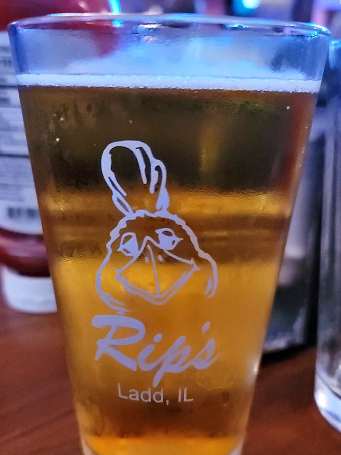 A golden pour of beer in a Rip's glass—because what pairs better with world-class fried chicken than a cold one from the tap?