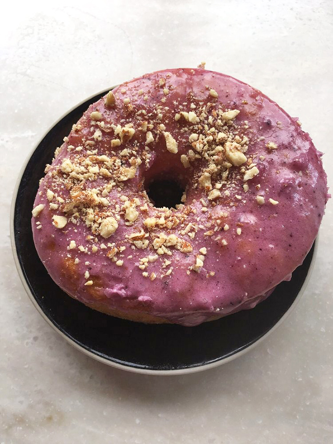 This purple-hued blueberry almond masterpiece isn't just a donut—it's edible art that happens to taste even better than it looks.