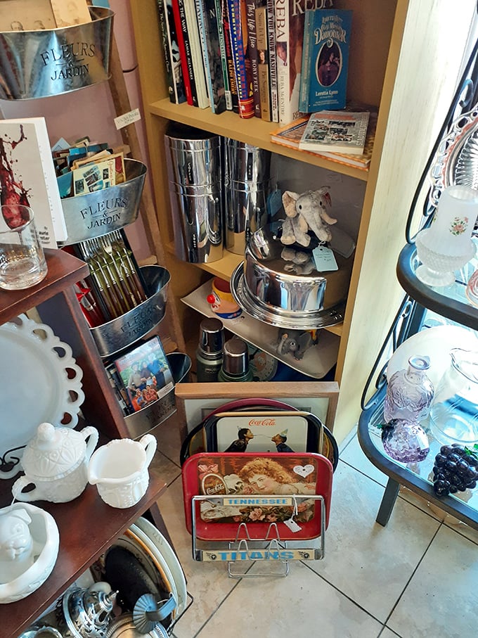 Metal containers marked "Fleurs Jardin" hold memories alongside books whose spines tell stories before you even open them.