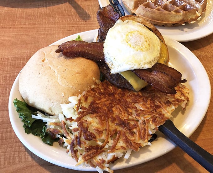 Breakfast burger with a sunny-side-up egg and crispy hash browns. When breakfast and lunch collaborate, everybody wins—especially your taste buds.