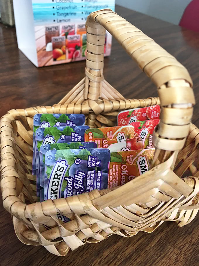 The wicker basket of jam packets—where the eternal debate between grape and strawberry has raged since time immemorial.