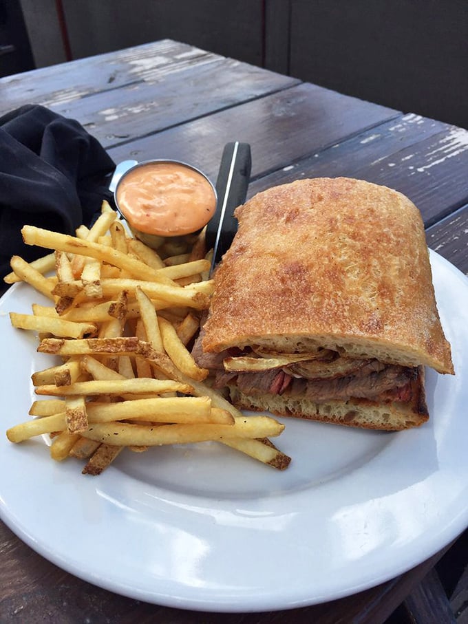 This sandwich isn't just lunch—it's a structural engineering marvel. The way it maintains integrity despite being packed with juicy goodness defies physics.