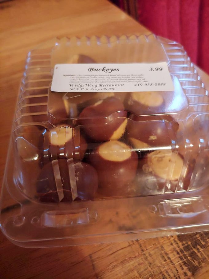Ohio's state candy in its natural habitat. These chocolate-dipped peanut butter Buckeyes aren't just treats—they're edible state pride.