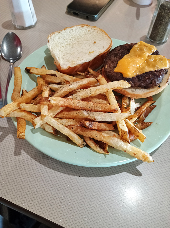A burger that understands its purpose in life is to deliver maximum satisfaction with minimum pretension. The fries got the memo too.