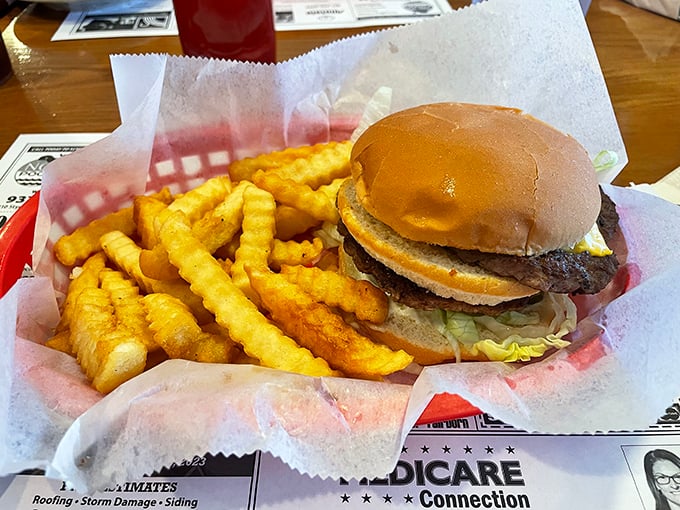 The classic American burger and fries—a combination more iconic than Batman and Robin, and significantly more satisfying after a long day.