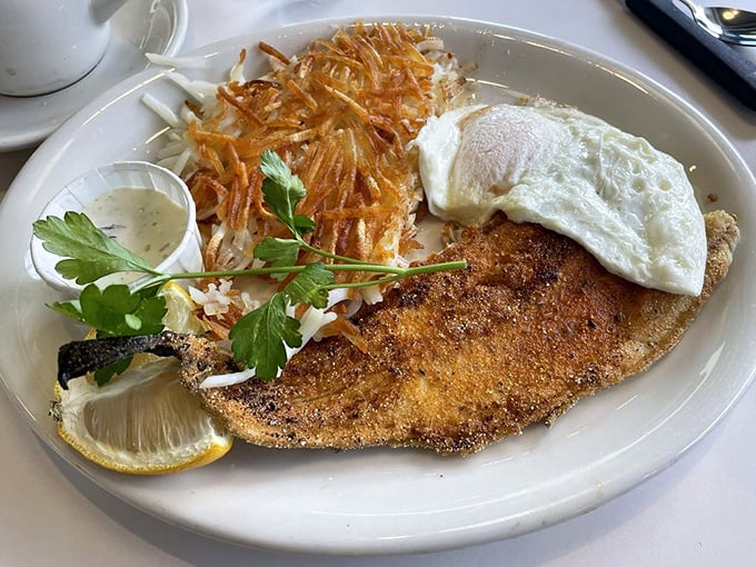 The Cajun trout with crispy hash browns proves that fish for breakfast isn't just acceptable—it's downright revolutionary.