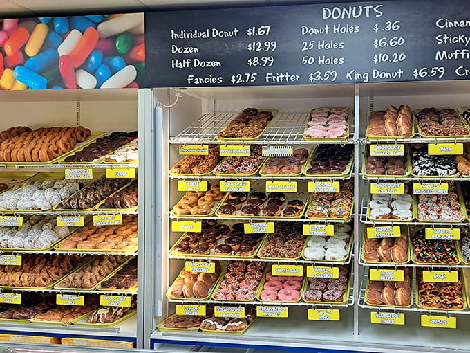 A donut display case that belongs in the Louvre. Art that's meant to be eaten, with flavors as vibrant as their colors.