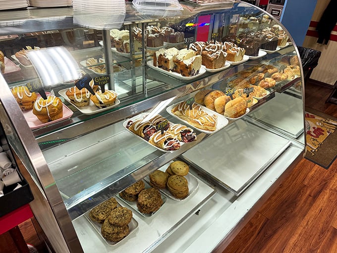 The pastry case—or as I call it, "The Museum of Delicious Decisions." Each shelf offers a different path to happiness.