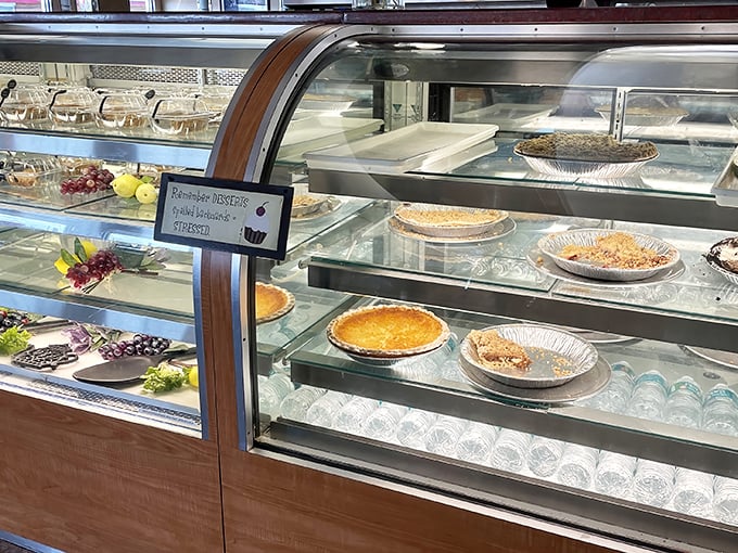 The dessert case – where willpower goes to die and "I'll just have a bite of yours" becomes the biggest lie you'll tell all day.