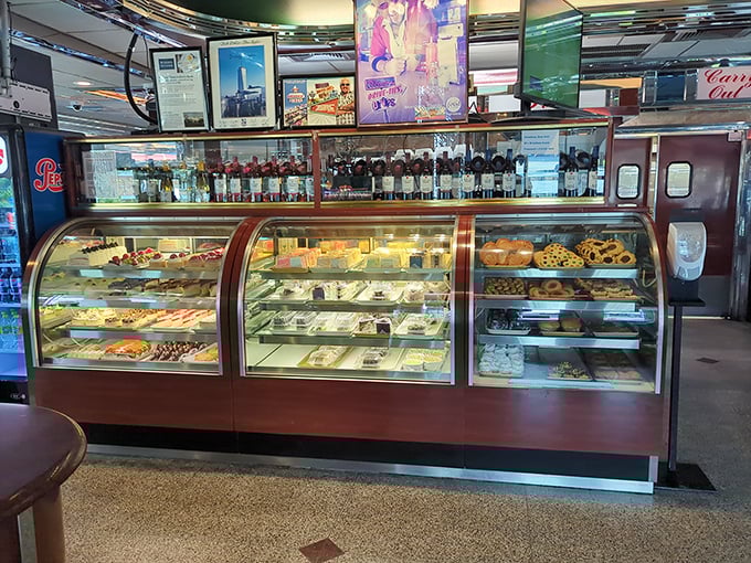 Not just desserts—these are glass-encased temptations that whisper "diet tomorrow" as you press your nose against the display.
