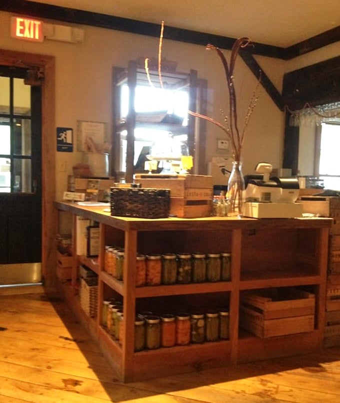 The market area showcases preserved local bounty – jars of summer sunshine waiting to brighten someone's pantry.