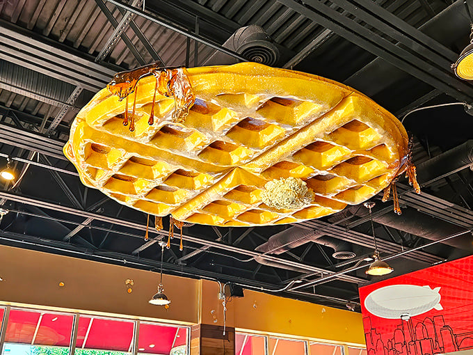 That giant waffle ceiling fixture isn't subtle, but neither is your hunger when you walk through these doors.