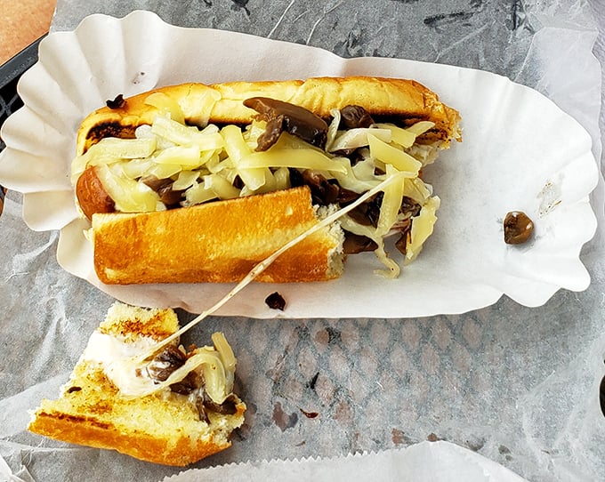 When a hot dog and a Philly cheesesteak love each other very much... this beautiful creation happens. The melted cheese stretches dramatically with each bite.