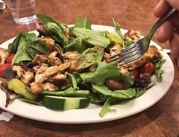 A chicken salad that proves healthy eating doesn't mean punishment – fresh greens and perfectly seasoned chicken playing nicely together.