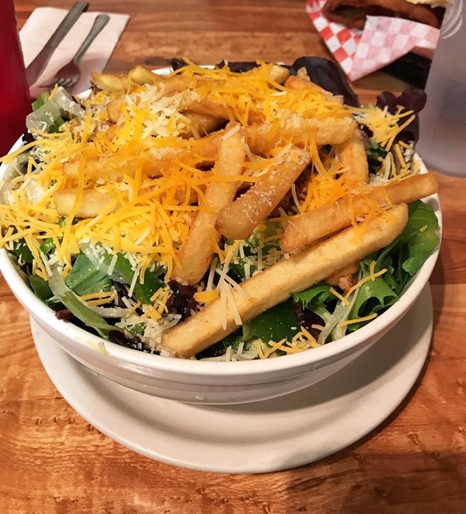 Pittsburgh's answer to the fancy salad trend: "Here's your greens, topped with enough fries and cheese to make it worth eating."