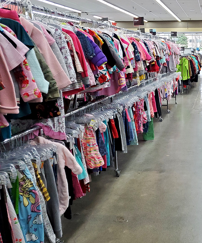 The children's clothing section bursts with color and possibility—tiny fashions at tiny prices for those who outgrow everything overnight.
