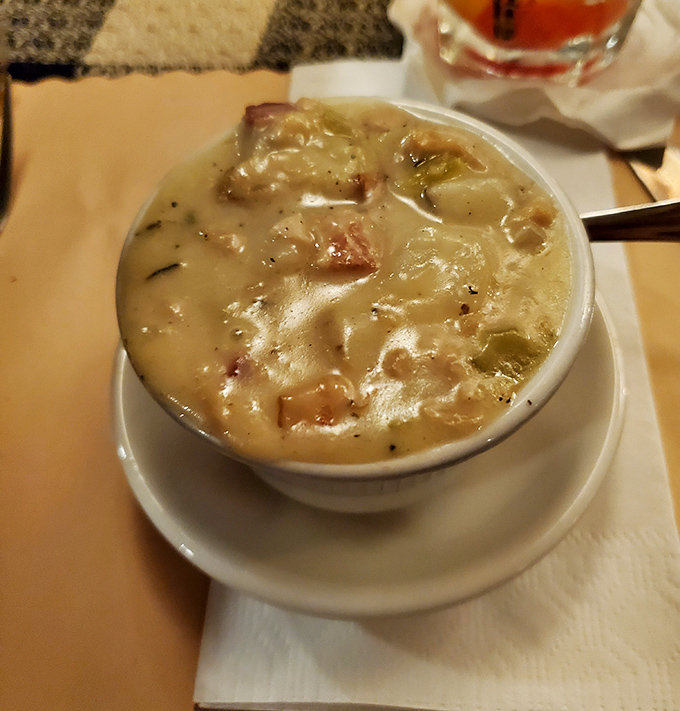 This isn't just clam chowder—it's a creamy bowl of maritime treasure hunting. Each spoonful reveals delicious buried secrets.