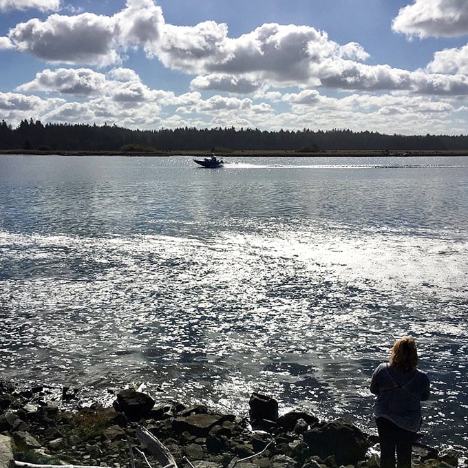 The Coquille River—where boats create silver wakes and onlookers create lifetime memories of that perfect Oregon afternoon.