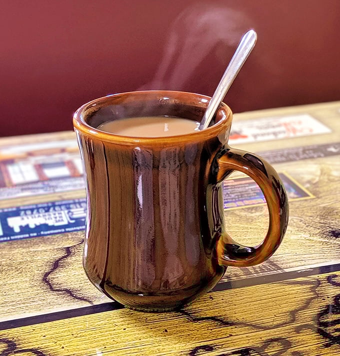 Steam rises from a sturdy mug of diner coffee – the kind that doesn't need fancy names or elaborate preparation to get the job done.