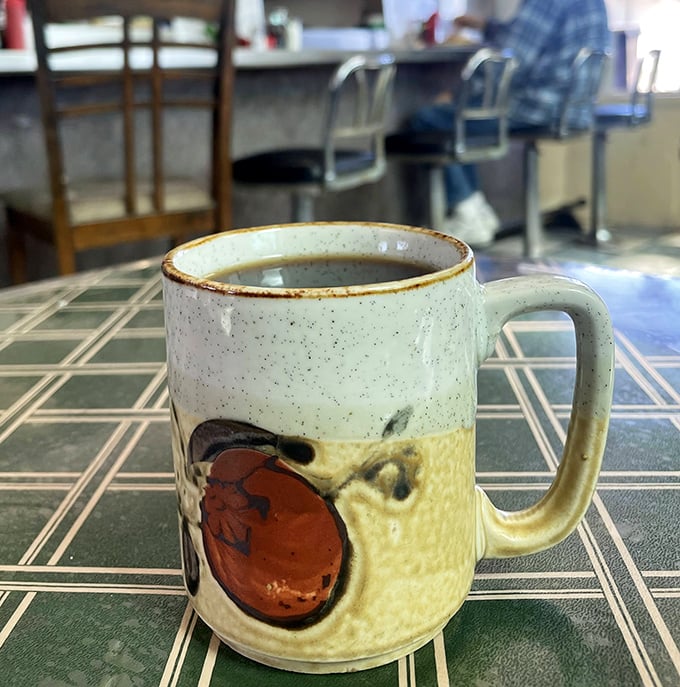 Even the coffee mugs have personality at Frank's – this handcrafted vessel delivers caffeine with a side of Arizona artistry.