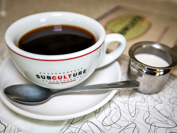 Coffee served in a proper cup—because some traditions deserve respect. The perfect companion to whatever comfort food you're about to devour.