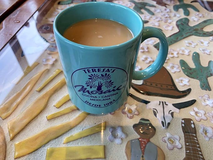 That turquoise mug isn't just holding coffee—it's cradling liquid motivation against a backdrop of Southwestern artistry. Morning fuel, elevated.