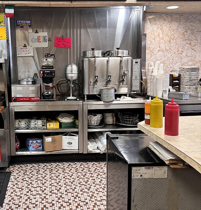 The coffee station—where the practical meets the necessary. No fancy espresso drinks here, just honest caffeine for honest people.