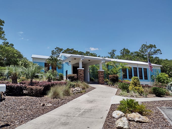 The visitor center welcomes explorers with Florida-friendly architecture and native landscaping—your gateway to underwater wonders.