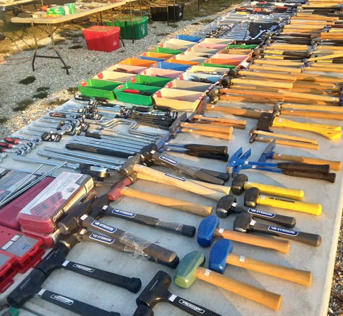 Tool heaven spreads before you—hammers with handles worn to the perfect patina line up like soldiers awaiting their next mission in capable hands.