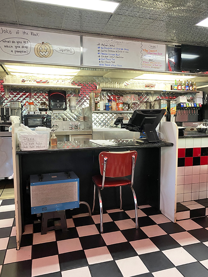 "Joke of the Week" on the whiteboard and a red vinyl stool waiting for you—diners aren't just about food, they're community gathering spots.