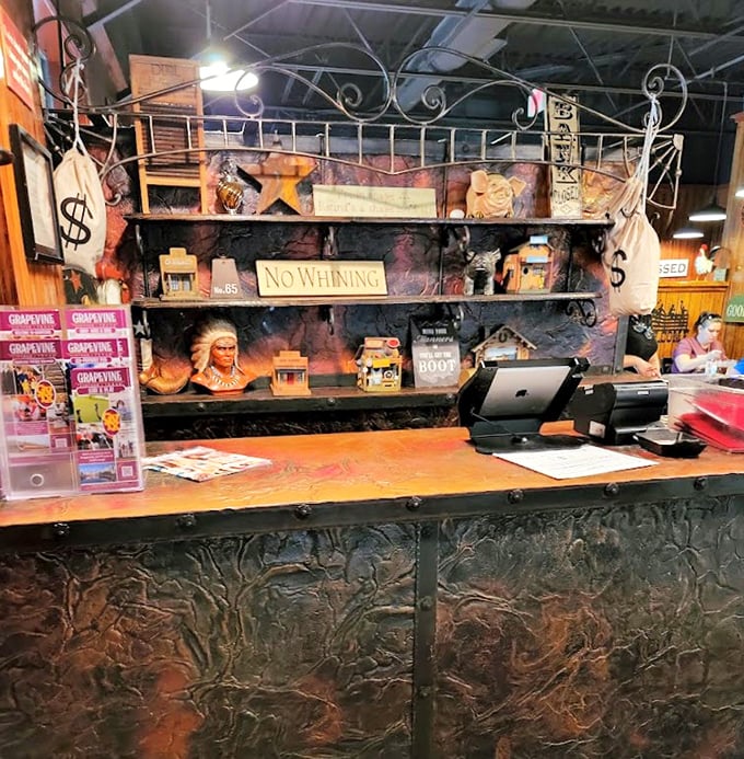 The "No Whining" sign behind the counter tells you everything you need to know about the attitude that makes this place special.