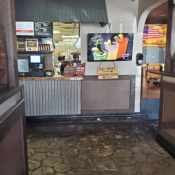 Where barbecue dreams begin their journey from order to plate. That corrugated metal front has witnessed countless expressions of anticipation.