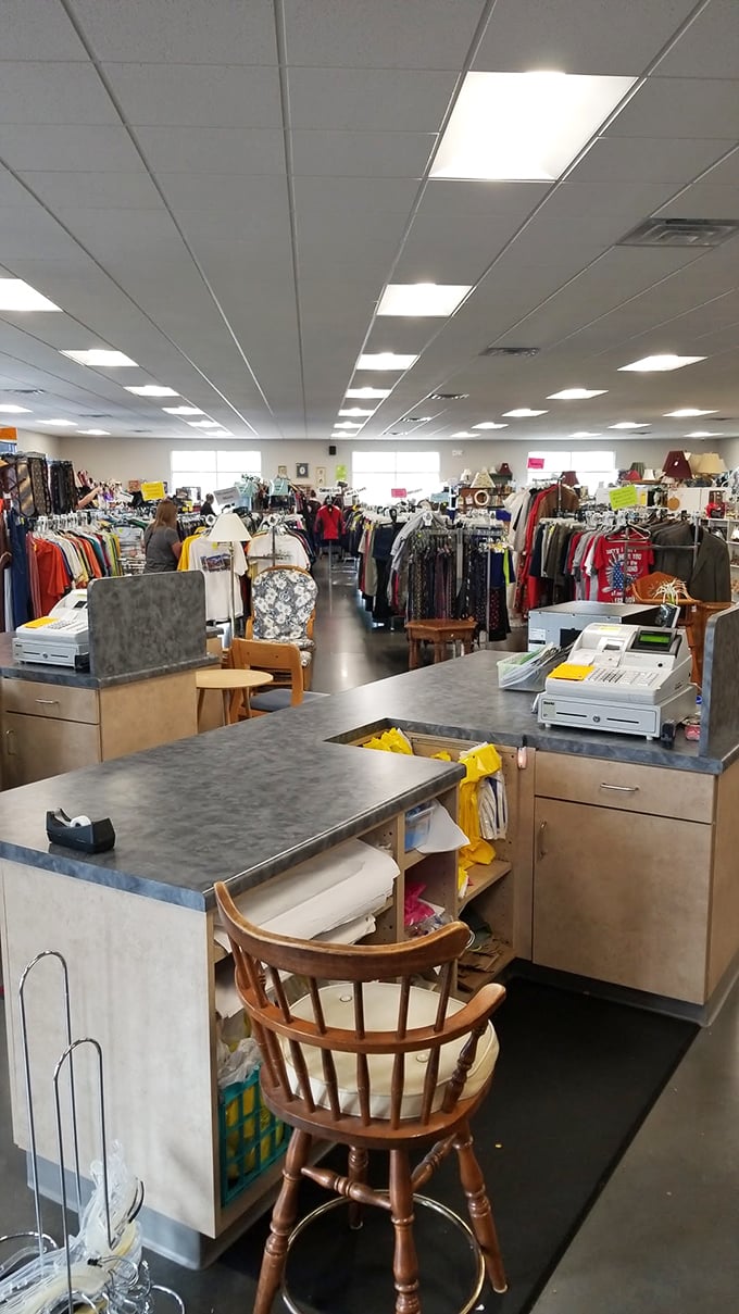 The checkout counter buzzes with activity as treasures find new homes and volunteers share in the joy of great finds.