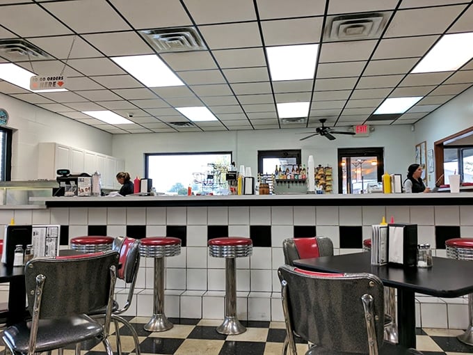 Counter culture at its finest – where black and white tiles meet red vinyl in a diner design that's eternally cool.