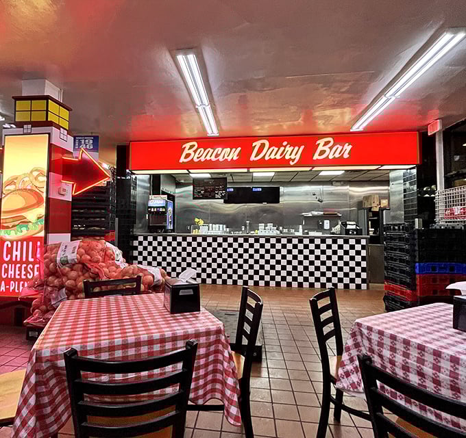 The Beacon Dairy Bar—where milkshake dreams come true. Red-checkered nostalgia served with a side of "they don't make 'em like this anymore."