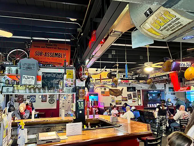 The counter view reveals the heart of BBQ operations. Those vintage collectibles aren't just decoration—they're silent witnesses to decades of smoked meat magic.