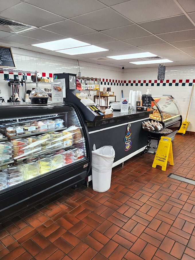 The café counter where beignet magic happens. Simple surroundings for extraordinary treats – priorities in perfect order.