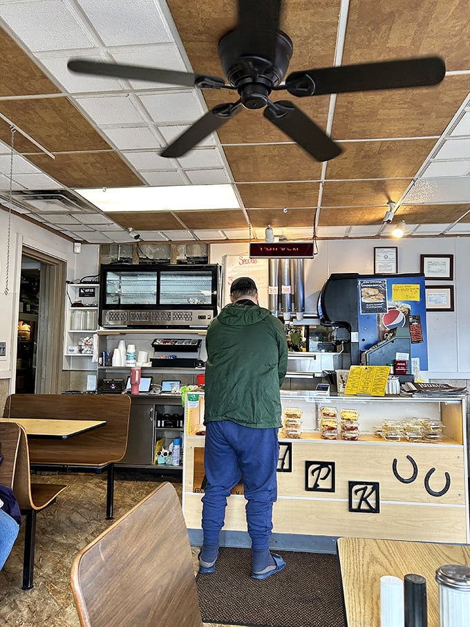 The ordering counter—where chicken dreams come true and diet plans go to die. Worth every calorie.