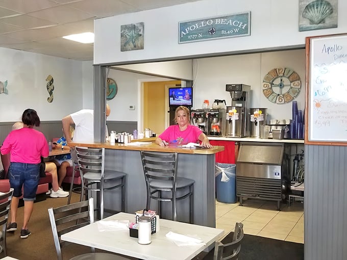 The beating heart of operations—a diner counter where coffee flows freely and friendly conversation is always on the menu.