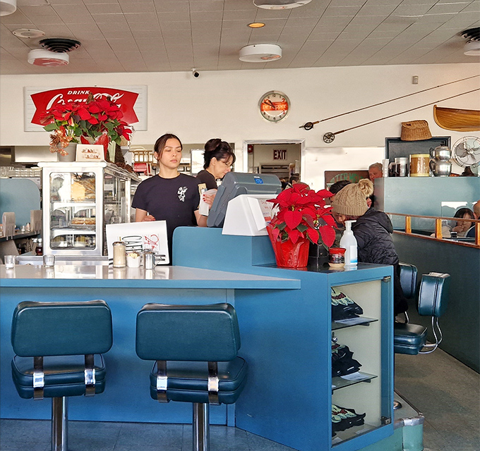 The heart of any great diner: a counter where coffee flows freely and the staff remembers your order before you've fully settled onto your stool.