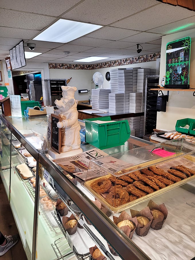 Behind every great bakery is a counter of temptation. That bear figurine isn't just decoration—he's the unofficial guardian of cookie quality.
