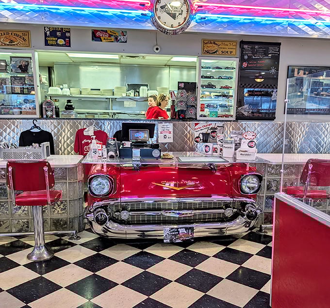 The crown jewel of Mary's Diner—a classic Chevy transformed into the coolest checkout counter in Ohio. Automotive history meets culinary delight.